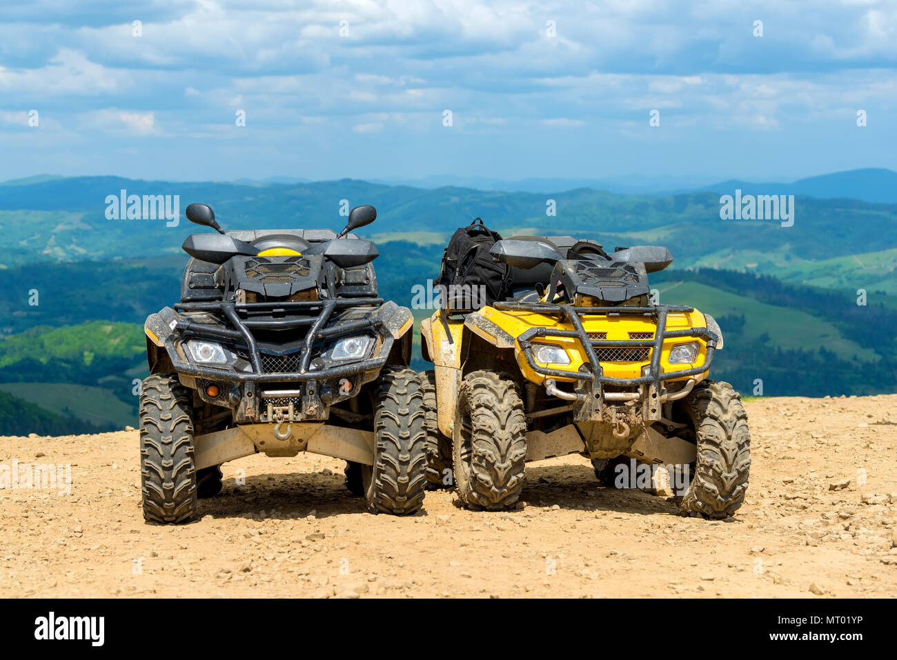 Two ATV Quad Bike in front of mountains landscape Stock Photo - Alamy