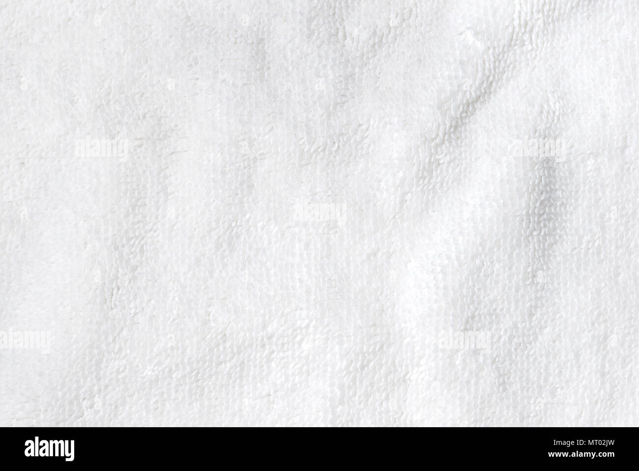 soft white texture of bath towel folded like background Stock Photo - Alamy