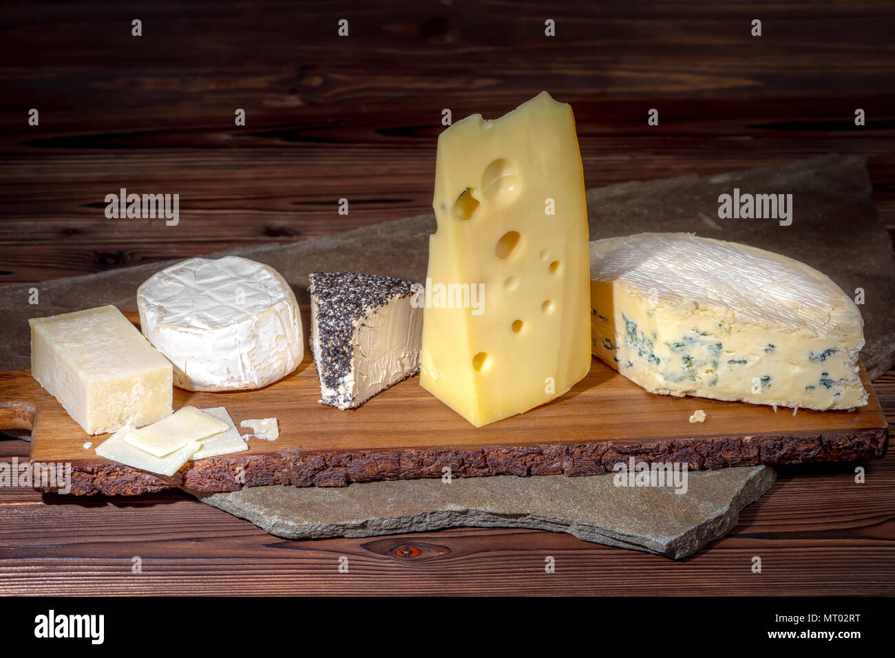 various types of cheeses on wooden background Stock Photo - Alamy