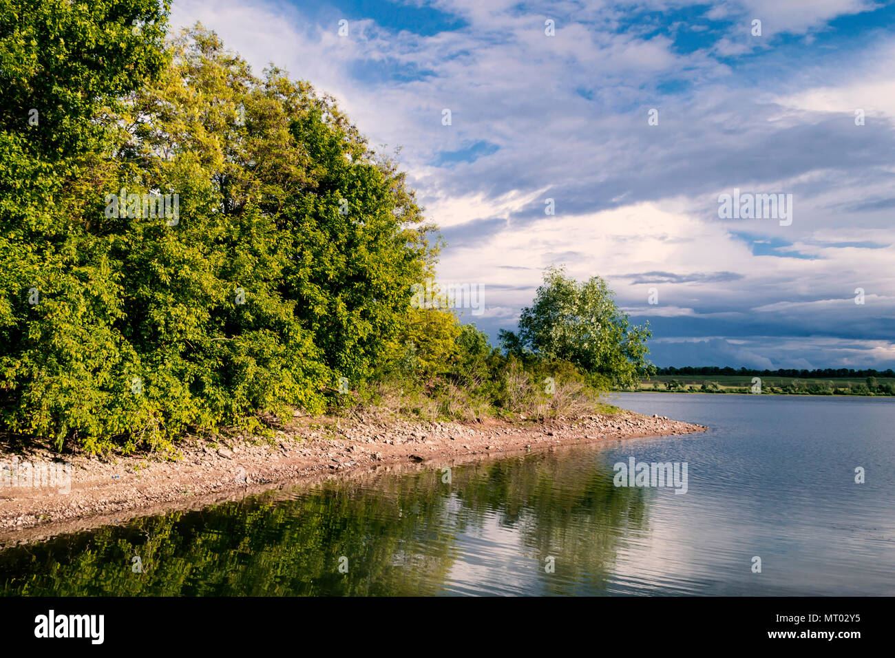 Beautiful river landscape. Calm river with colorful sky reflection on ...