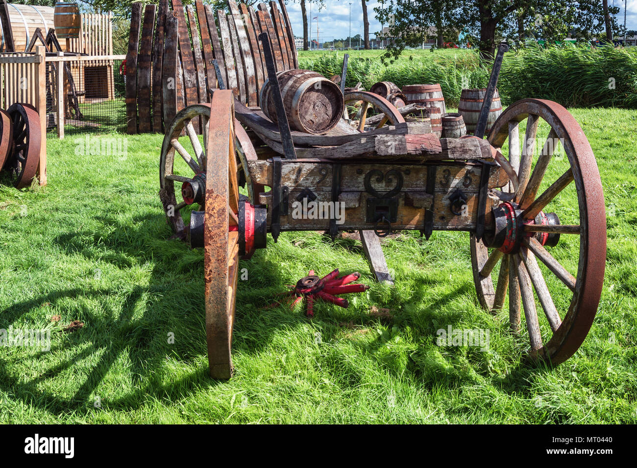 An old barrel car parked in the grass Stock Photo - Alamy