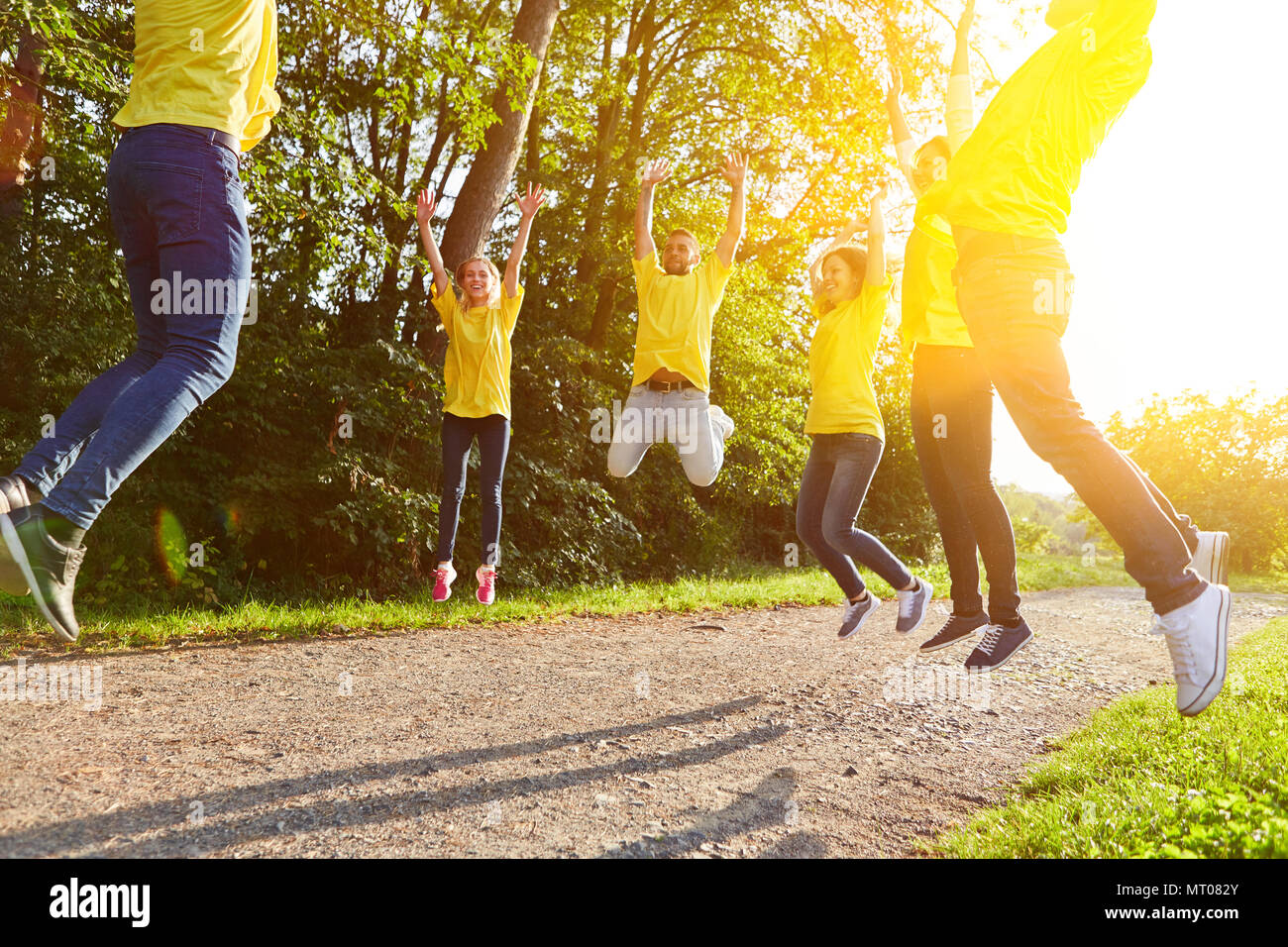 Team jumping hi-res stock photography and images - Alamy