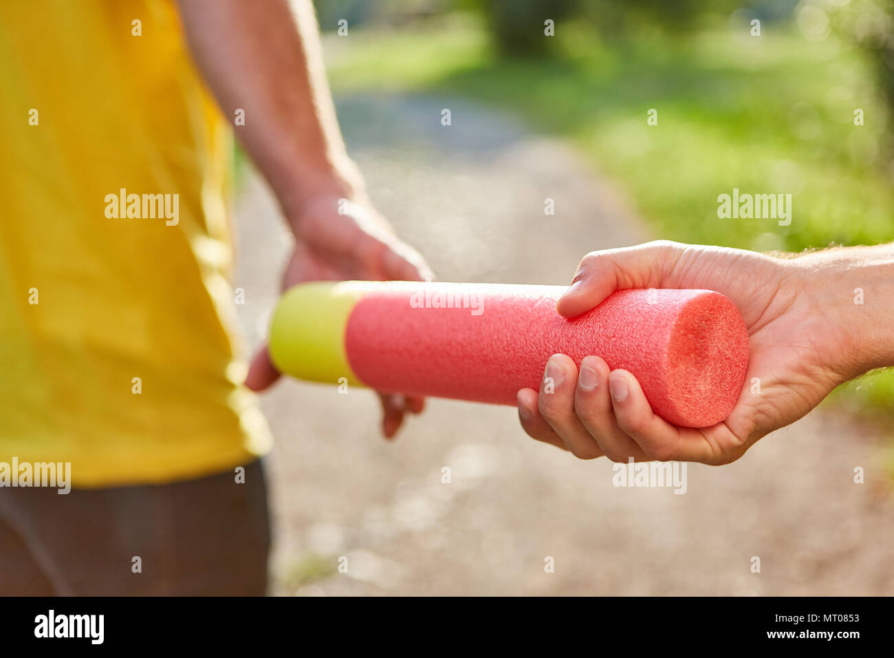 Hand over of the baton hi-res stock photography and images - Alamy