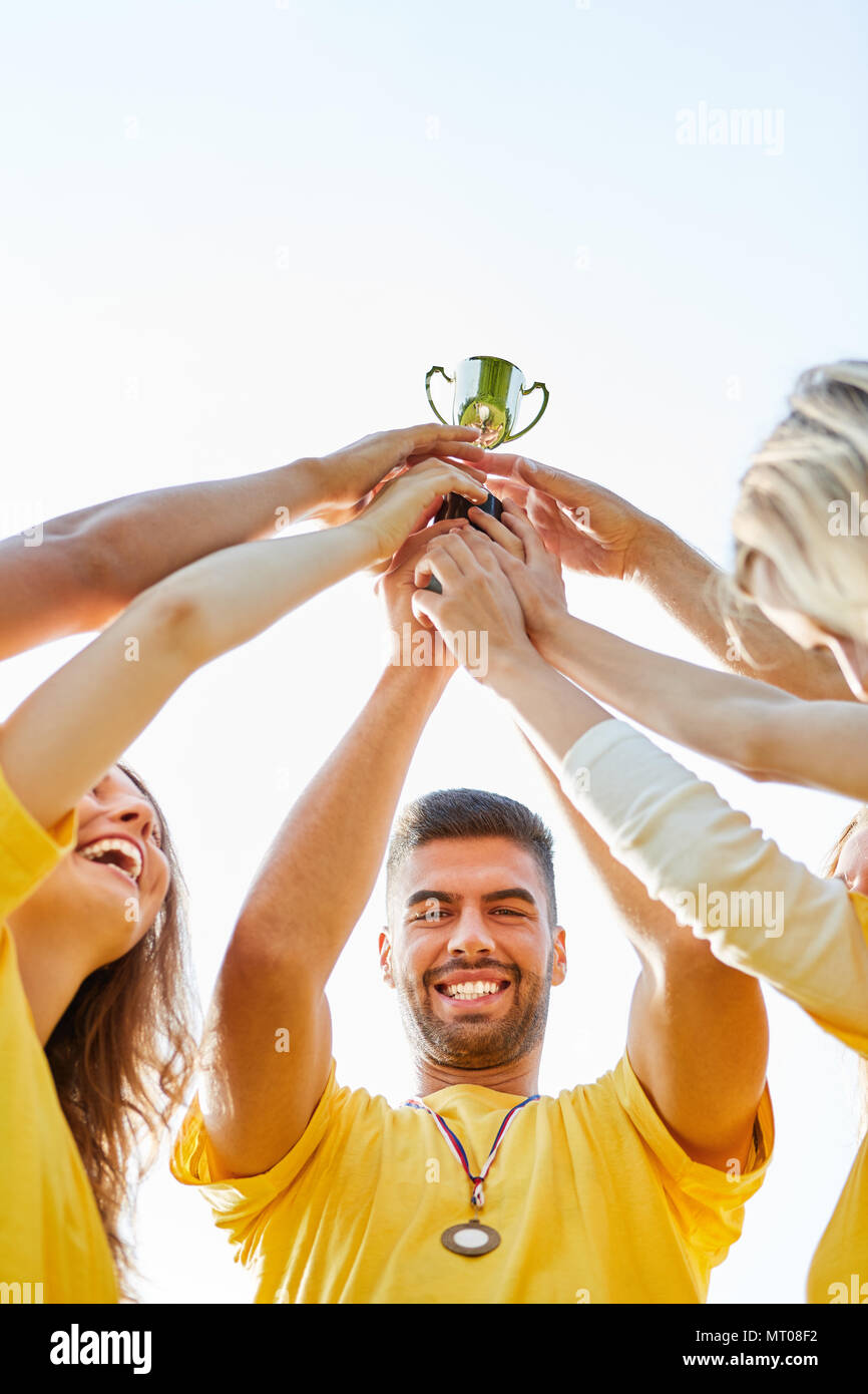 Man holding trophy hi-res stock photography and images - Alamy