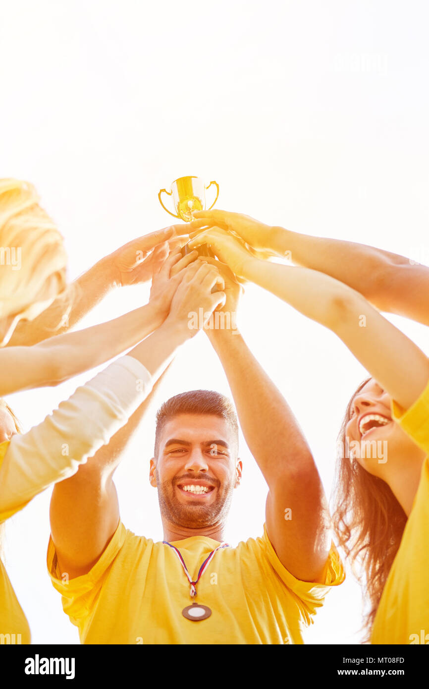 Sport team with trophy hi-res stock photography and images - Alamy
