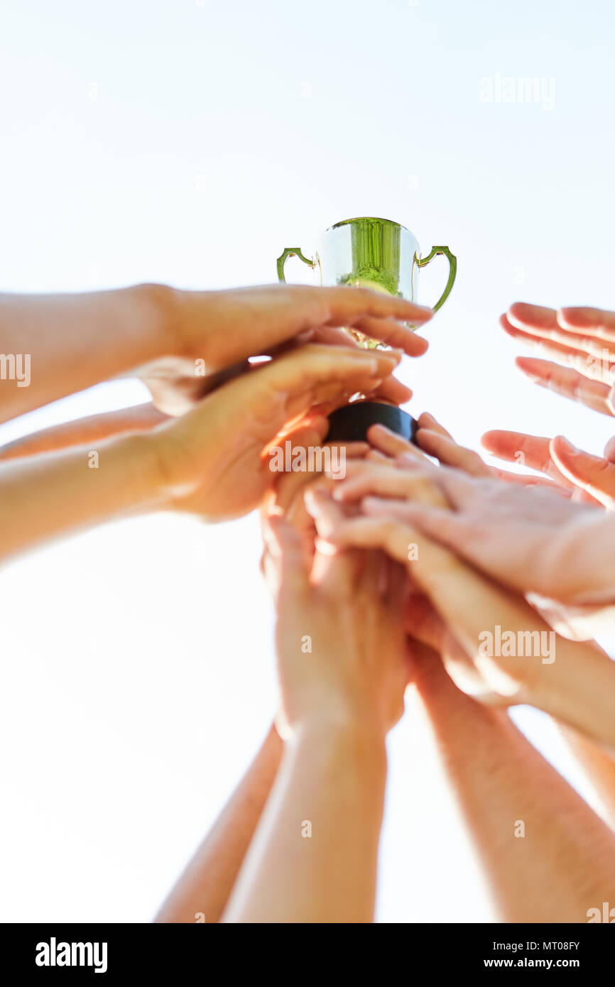 Team celebration trophy hi-res stock photography and images - Alamy
