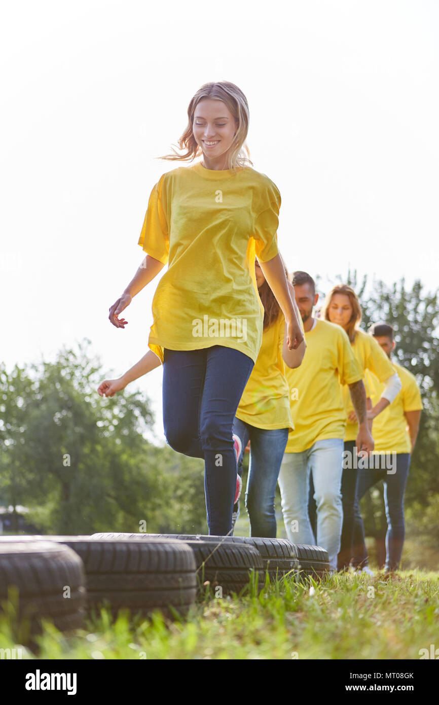 Young sporty team in a competition in teambuilding event Stock Photo ...