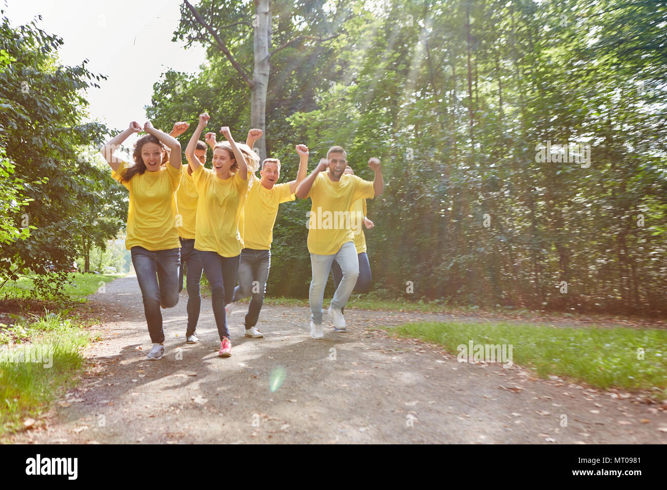Woman running in park winner hi-res stock photography and images - Alamy