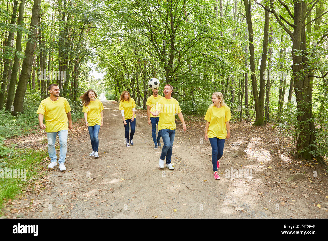 Happy group young friends play hi-res stock photography and images - Alamy