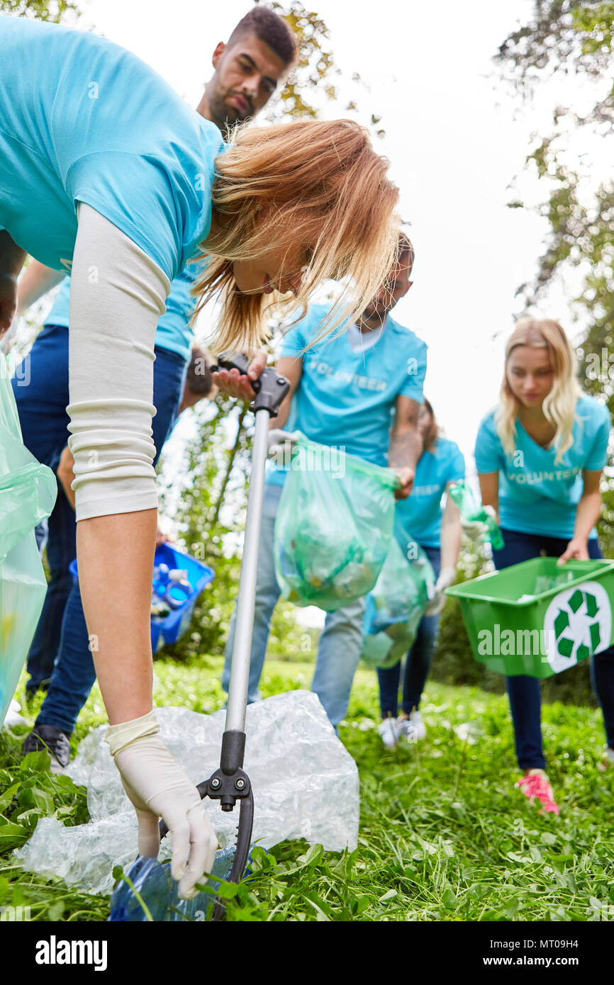 Volunteers clean a park of garbage in an environmental action Stock ...