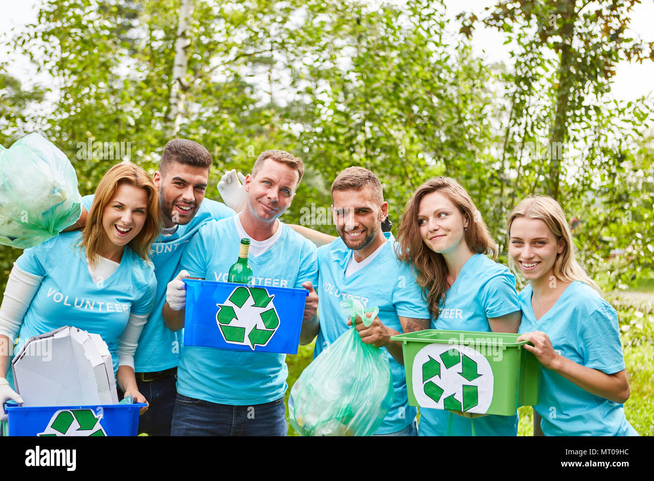 Volunteers of an environmental protection group collect garbage for ...