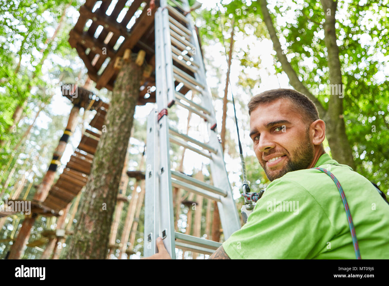 Man up ladder hi-res stock photography and images - Alamy