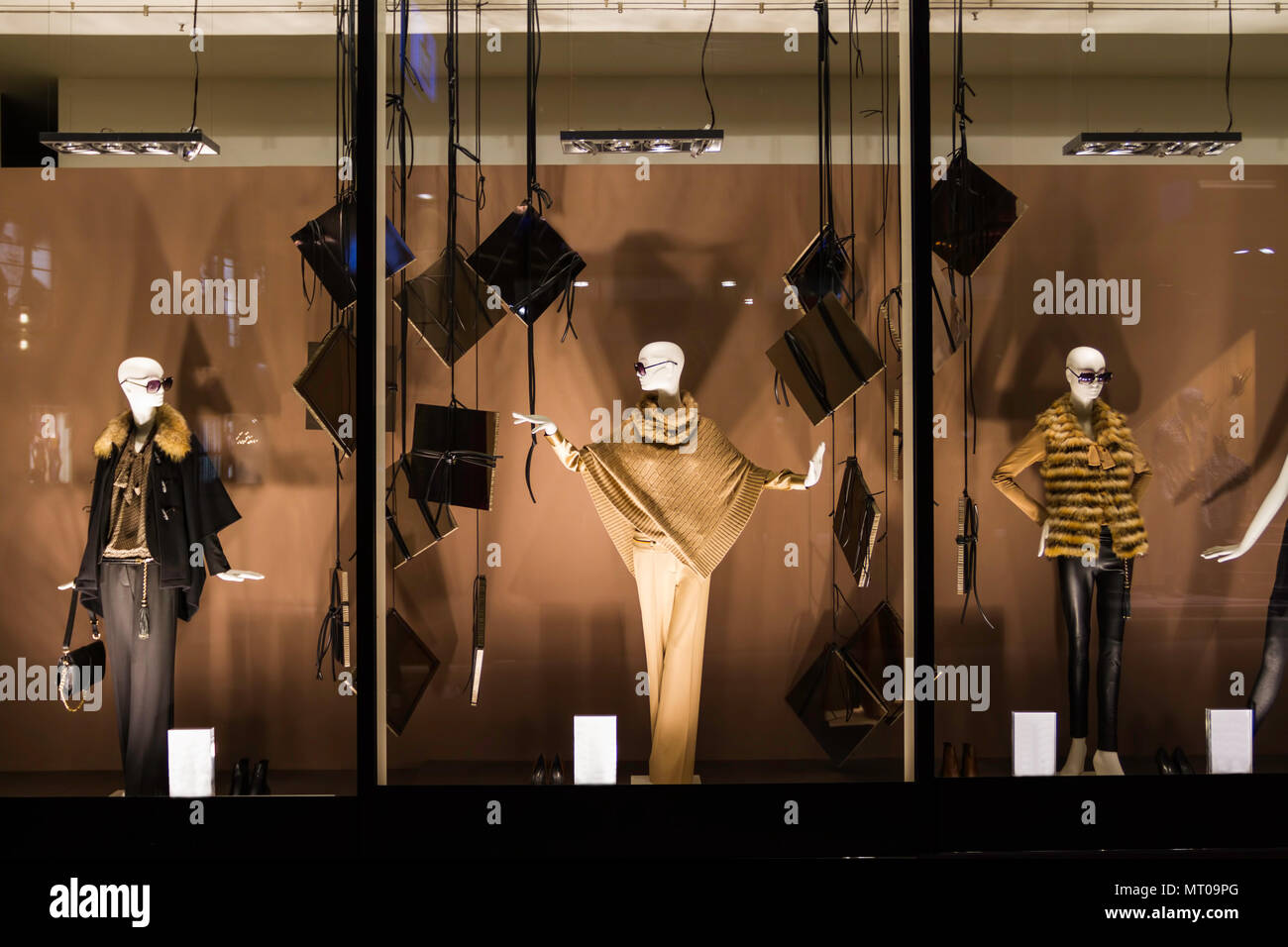 Mannequins standing in the shop window Display casual clothing store ...