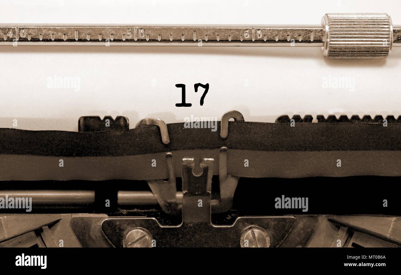17 Number text written by an old typewriter on white sheet Stock Photo ...