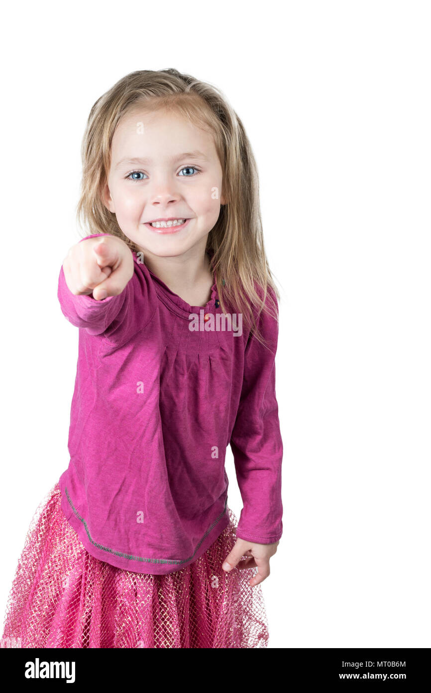 Cheerful little girl points with a finger Stock Photo - Alamy