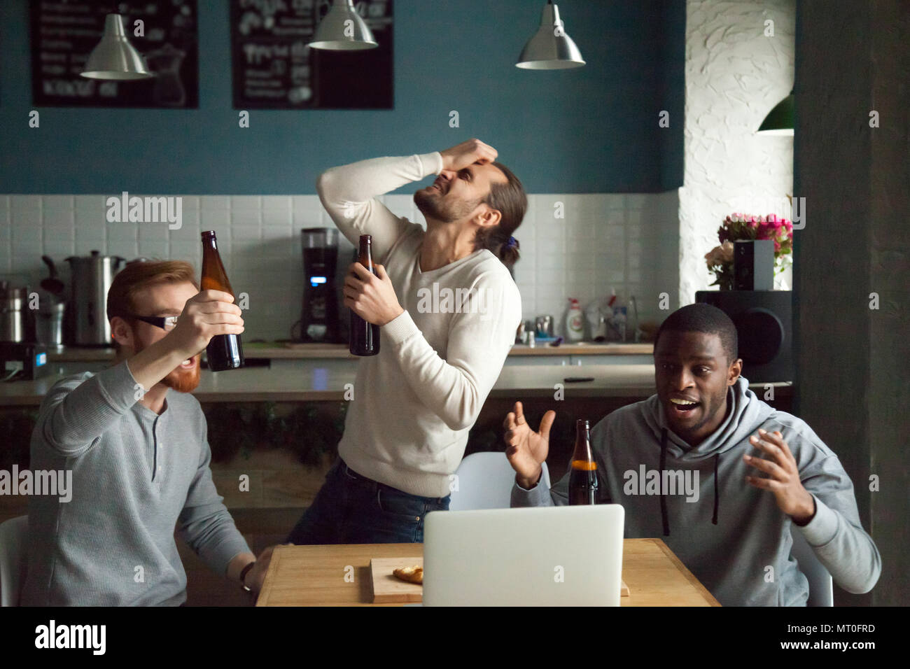 Diverse people watching video on hi-res stock photography and images ...