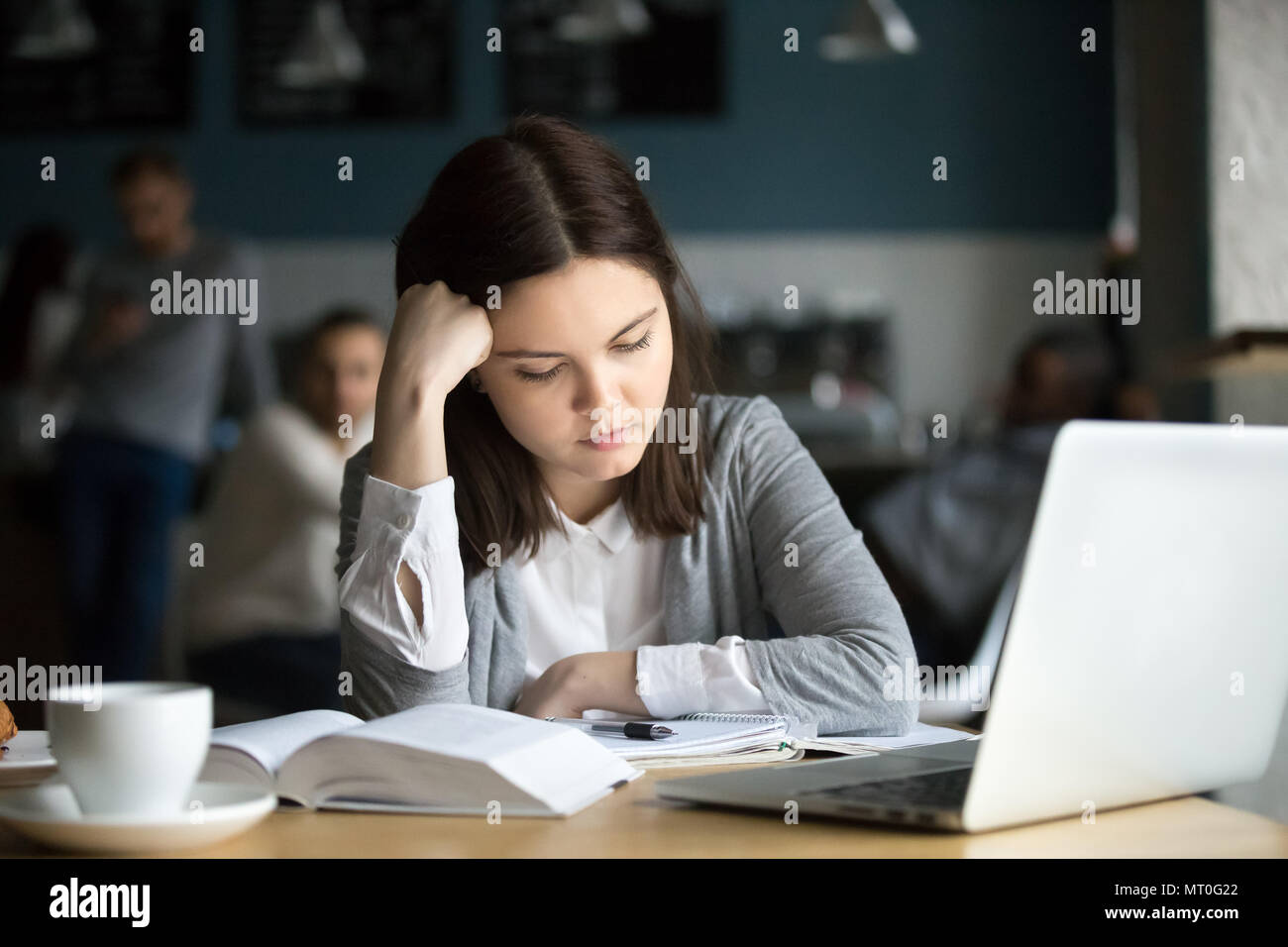 Bored of difficult studying tired millennial student sitting in Stock ...