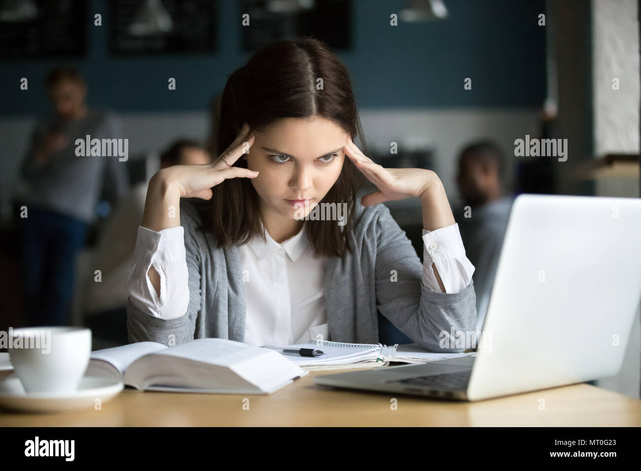 Frustrated stressed student learning difficult exam with laptop Stock ...