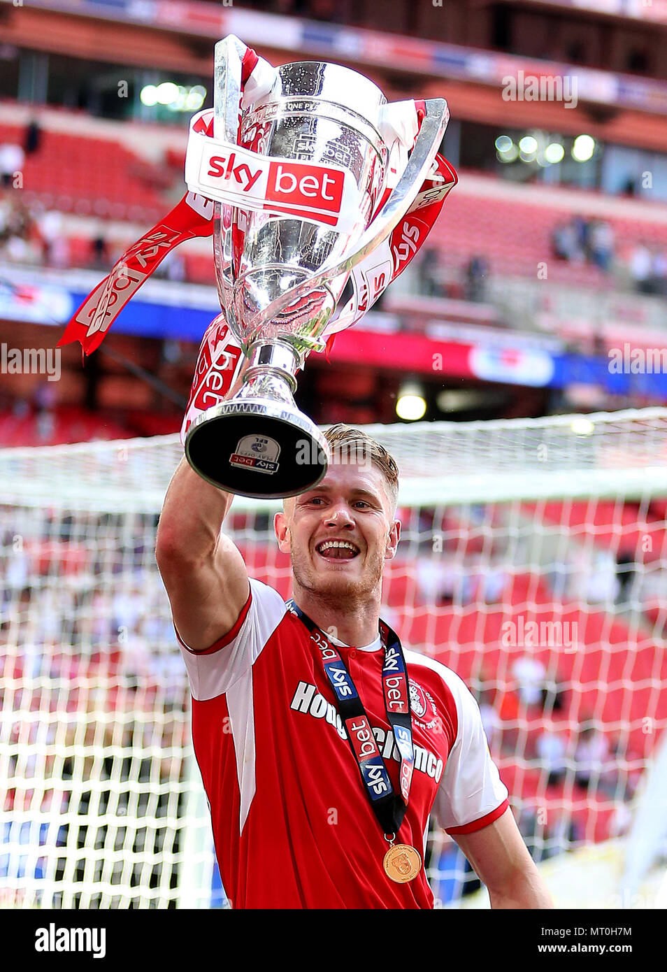 Rotherham United's Michael Smith celebrates with the trophy after the ...