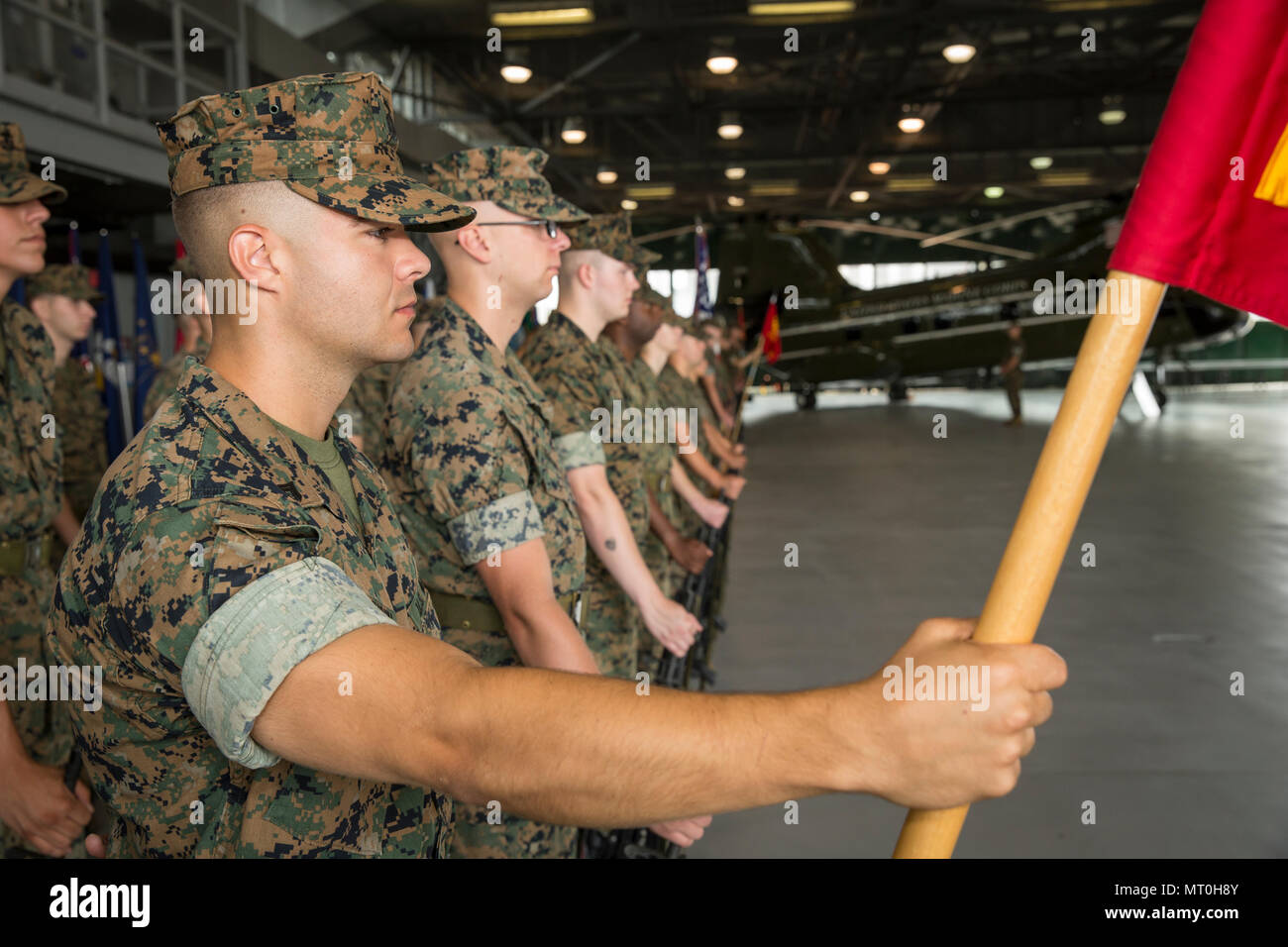 U.S. Marines with Marine Corps Air Facility (MCAF) stand at parade rest ...