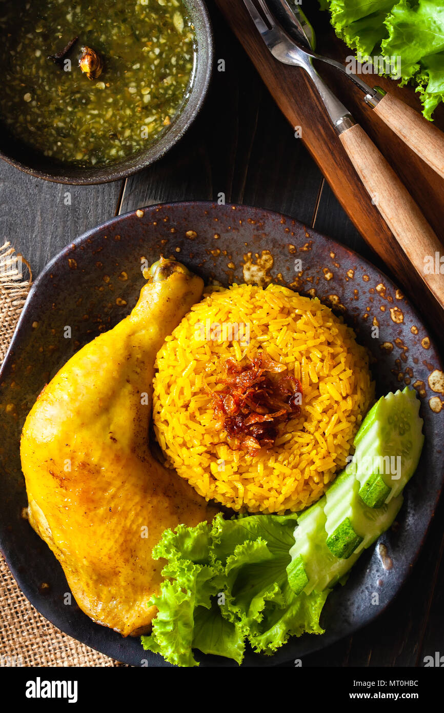 yellow rice with chicken or chicken biryani with rice Stock Photo - Alamy