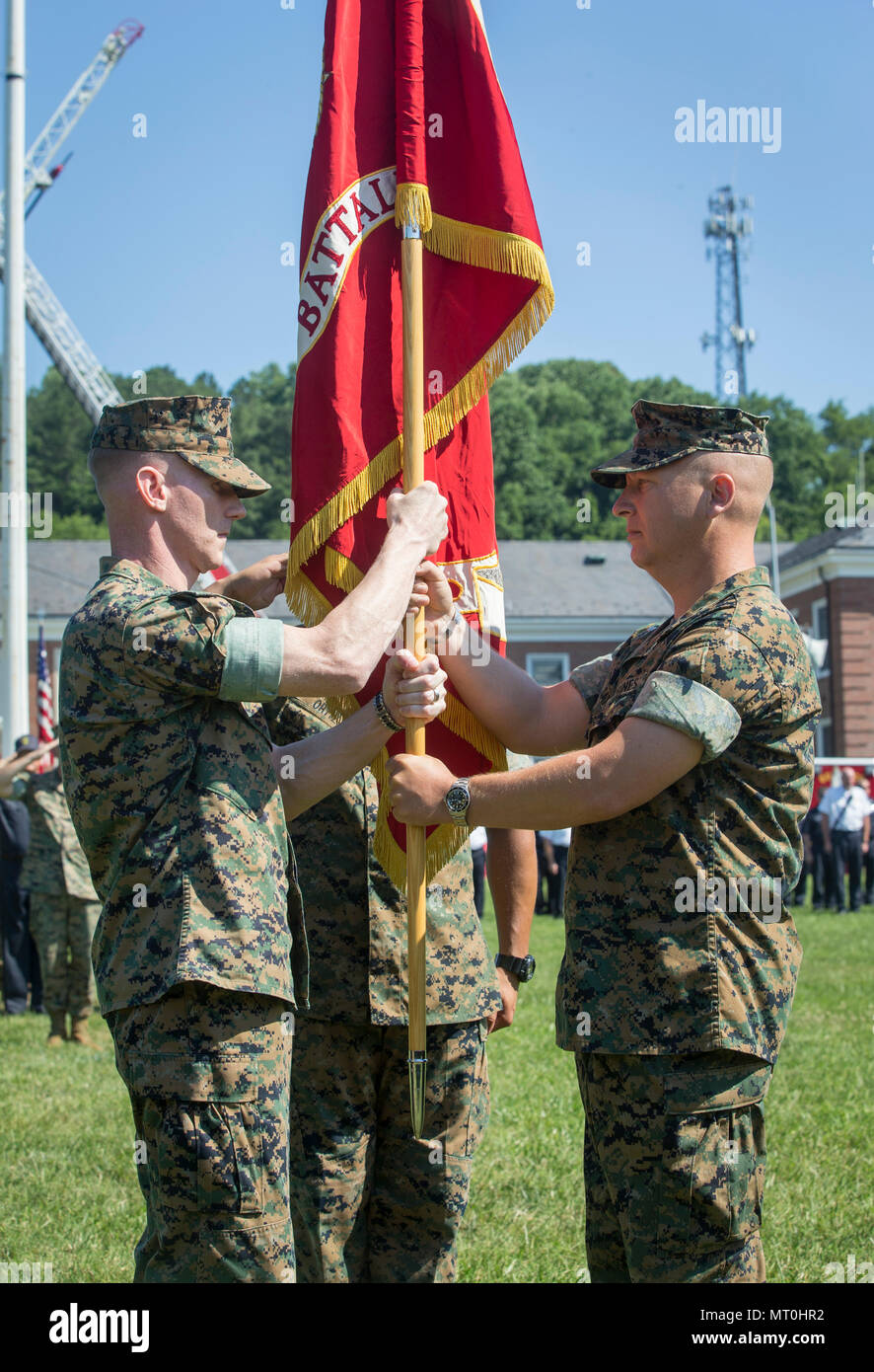 U.S. Marine Corps Lt. Col. Robert E. Cato II, right, outgoing ...