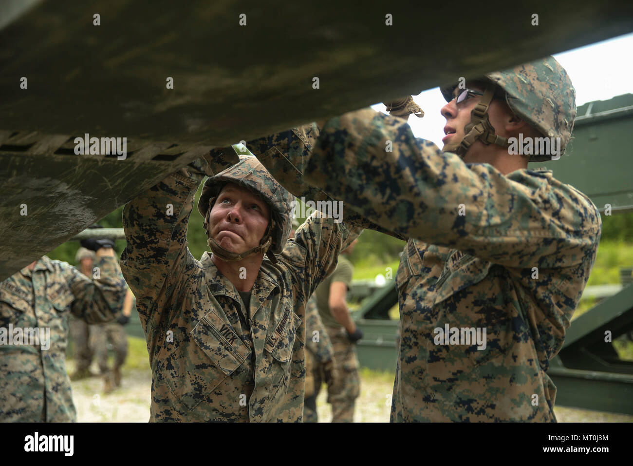 U.S. Marine Corps Cpl. Mason Vick, left, and Lance Cpl. Nathaniel J ...
