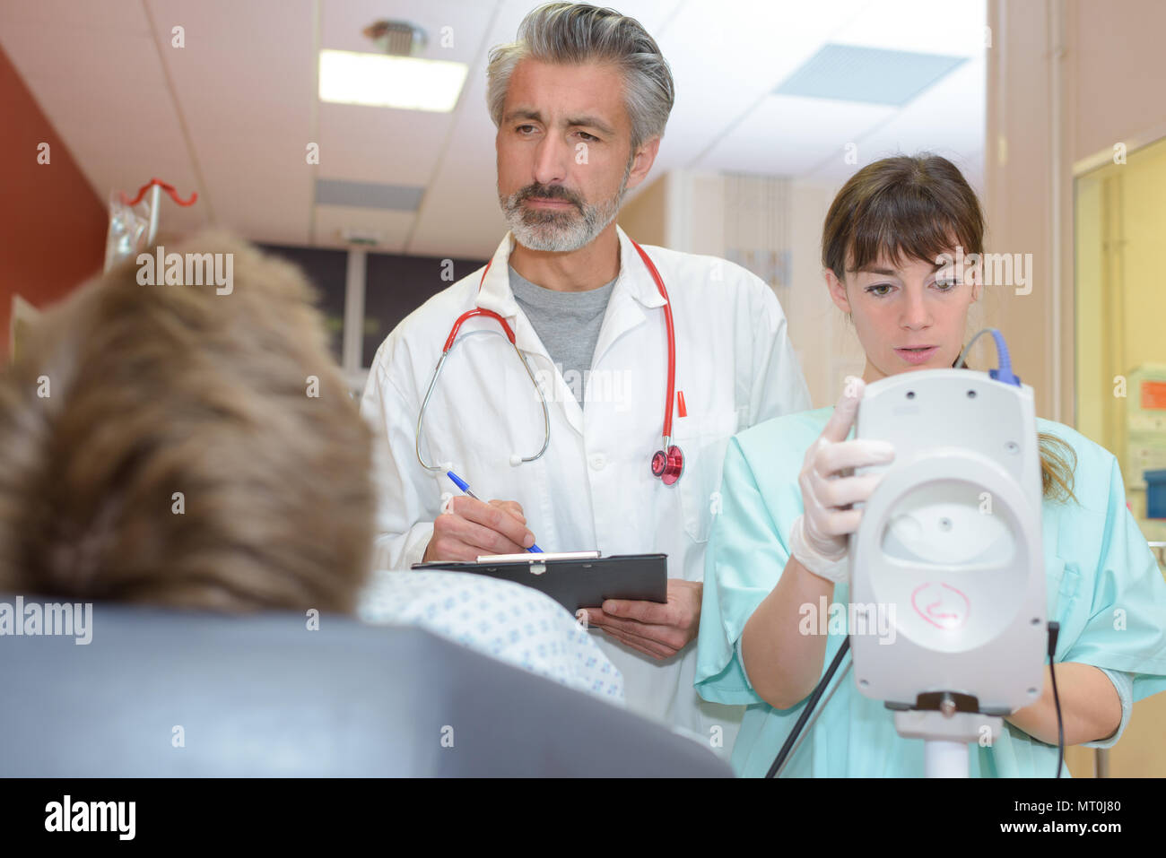 doctors telling patient the diagnosis Stock Photo - Alamy