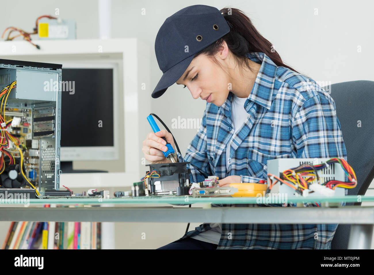 electronic equipment assembler Stock Photo - Alamy