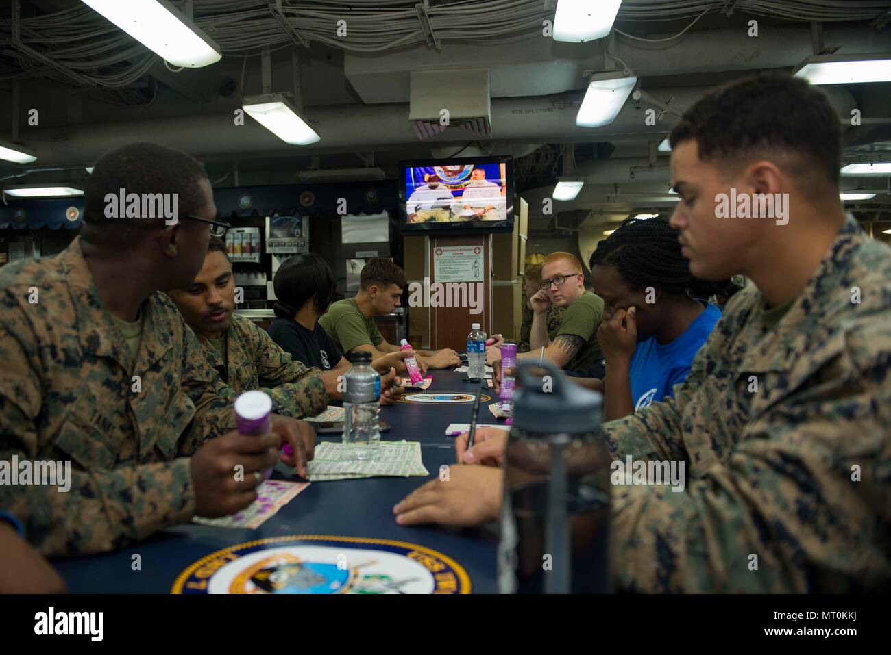 ATLANTIC OCEAN (July 14, 2017) Sailors and Marines play bingo on the ...