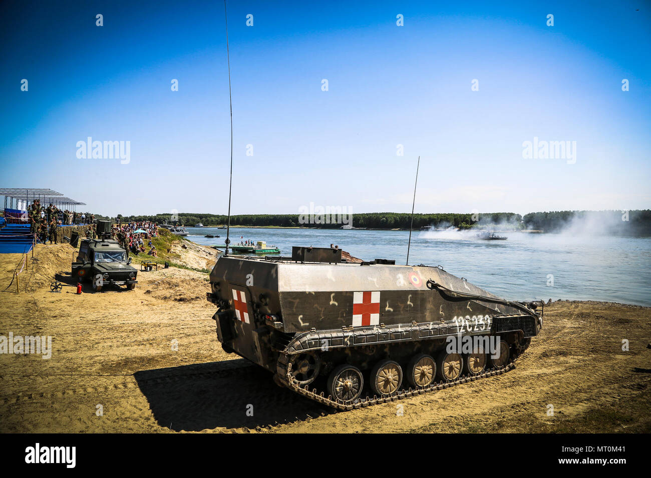 A Romanian armored medical evacuation vehicle awaits a simulated ...