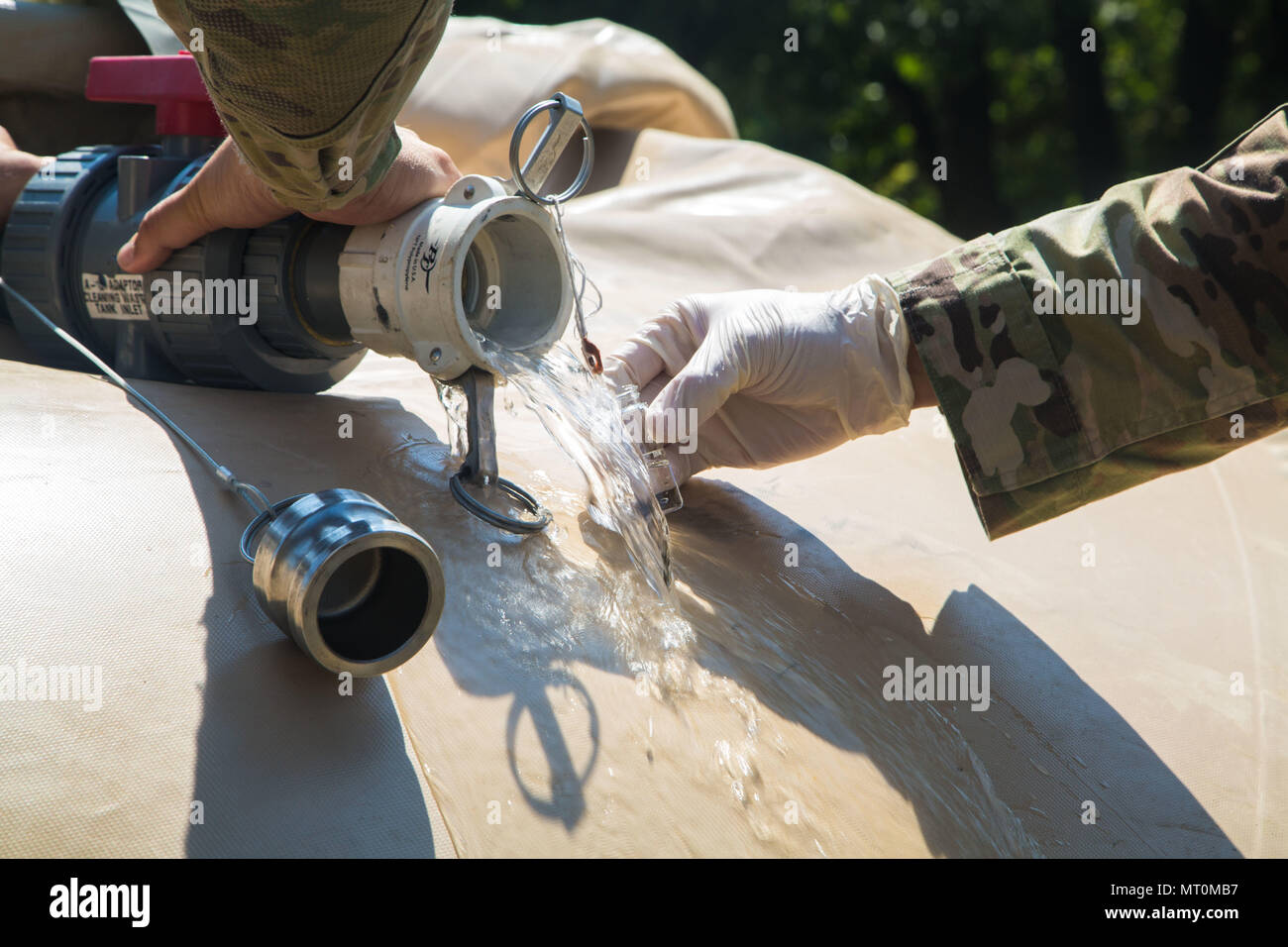 U.S. Army Sgt. Joshua Holtsberg, assigned 21st TSC (Theater Sutainment ...