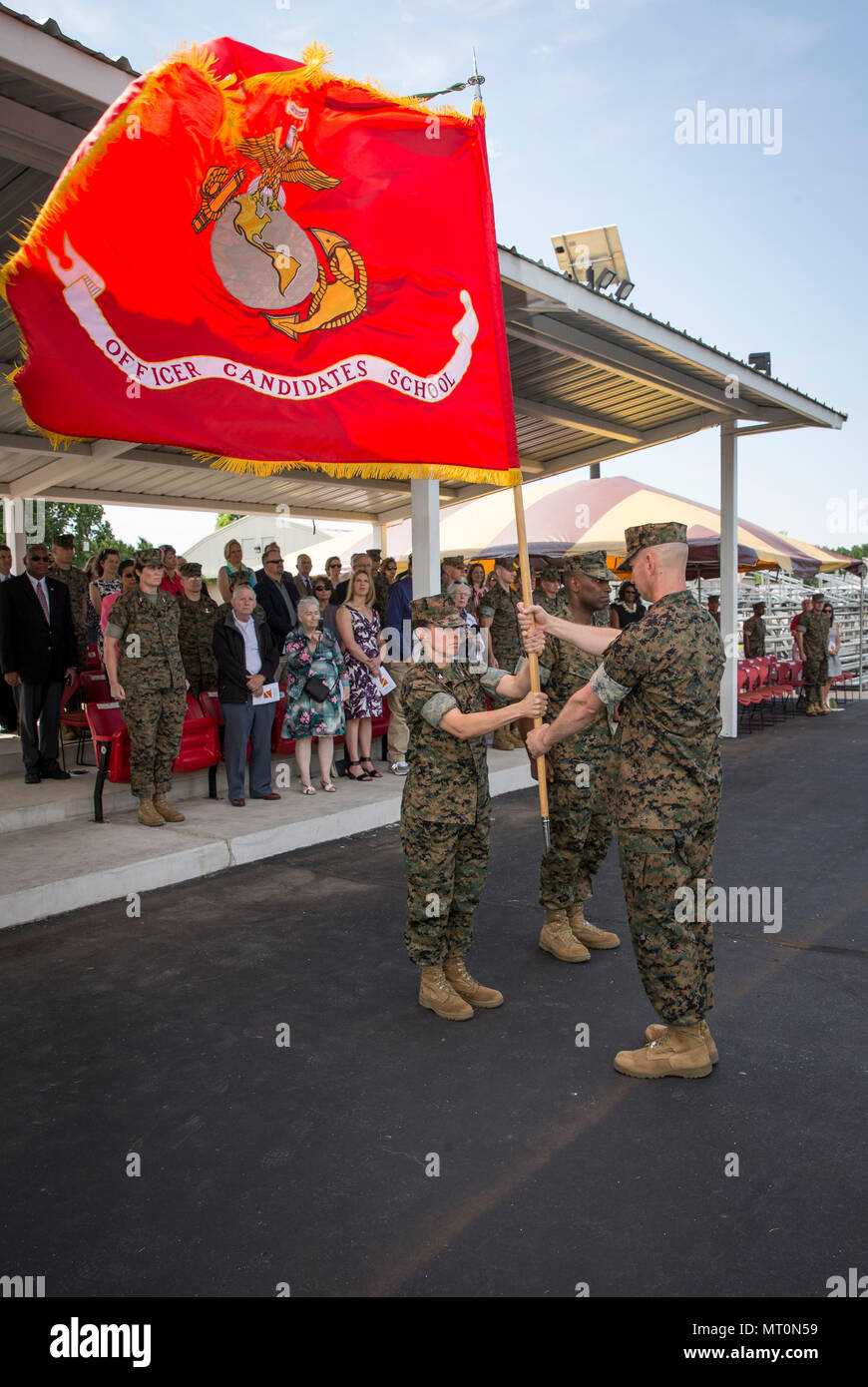 The U.S. Marine Corps flag is passed to Col. Julie L. Nethercot ...