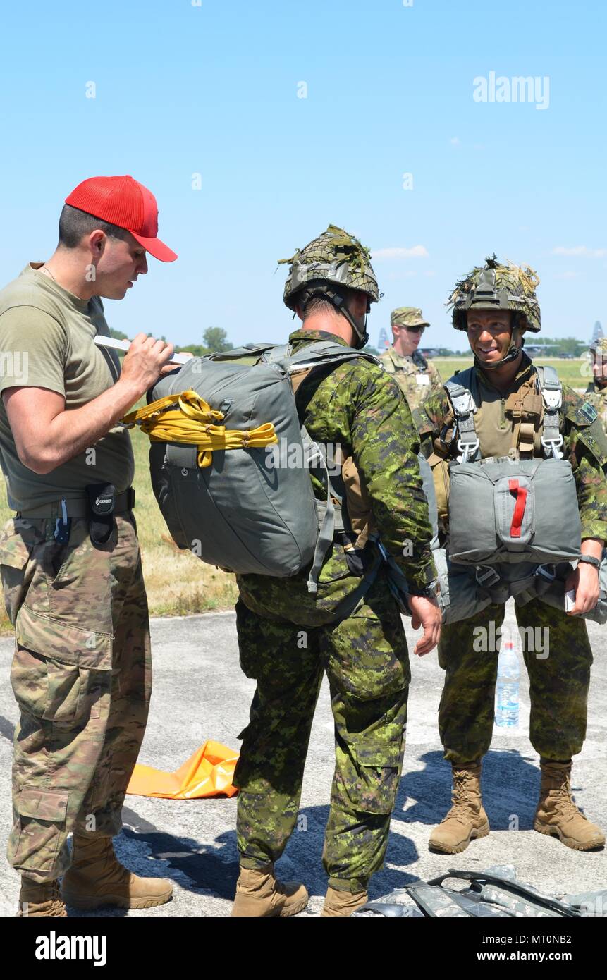 PAPA AIR BASE, Hungary — Soldiers don gear in preparation for an ...