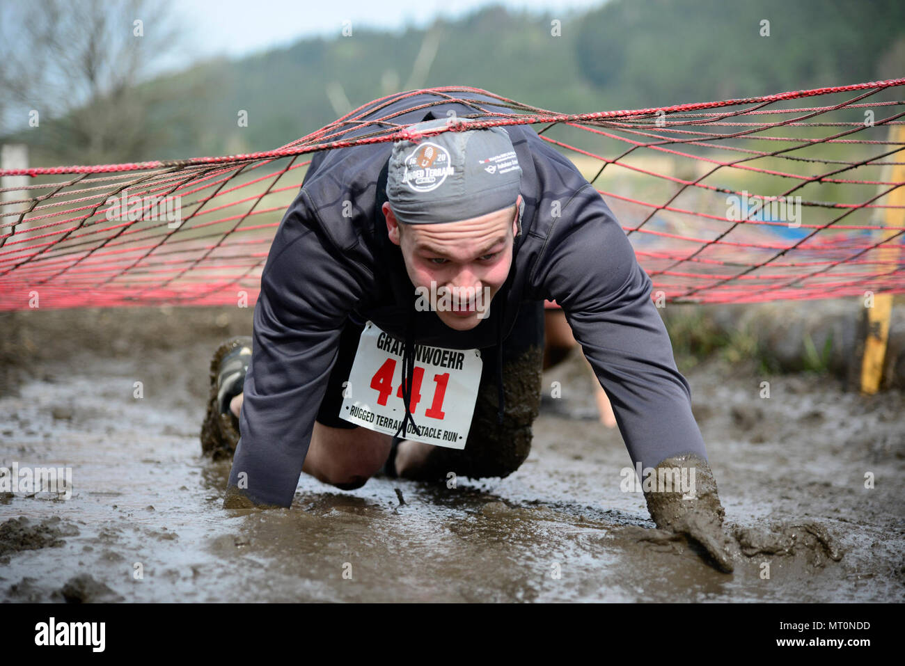 Runners participate in the annual Rugged Terrain Obstacle Run at ...