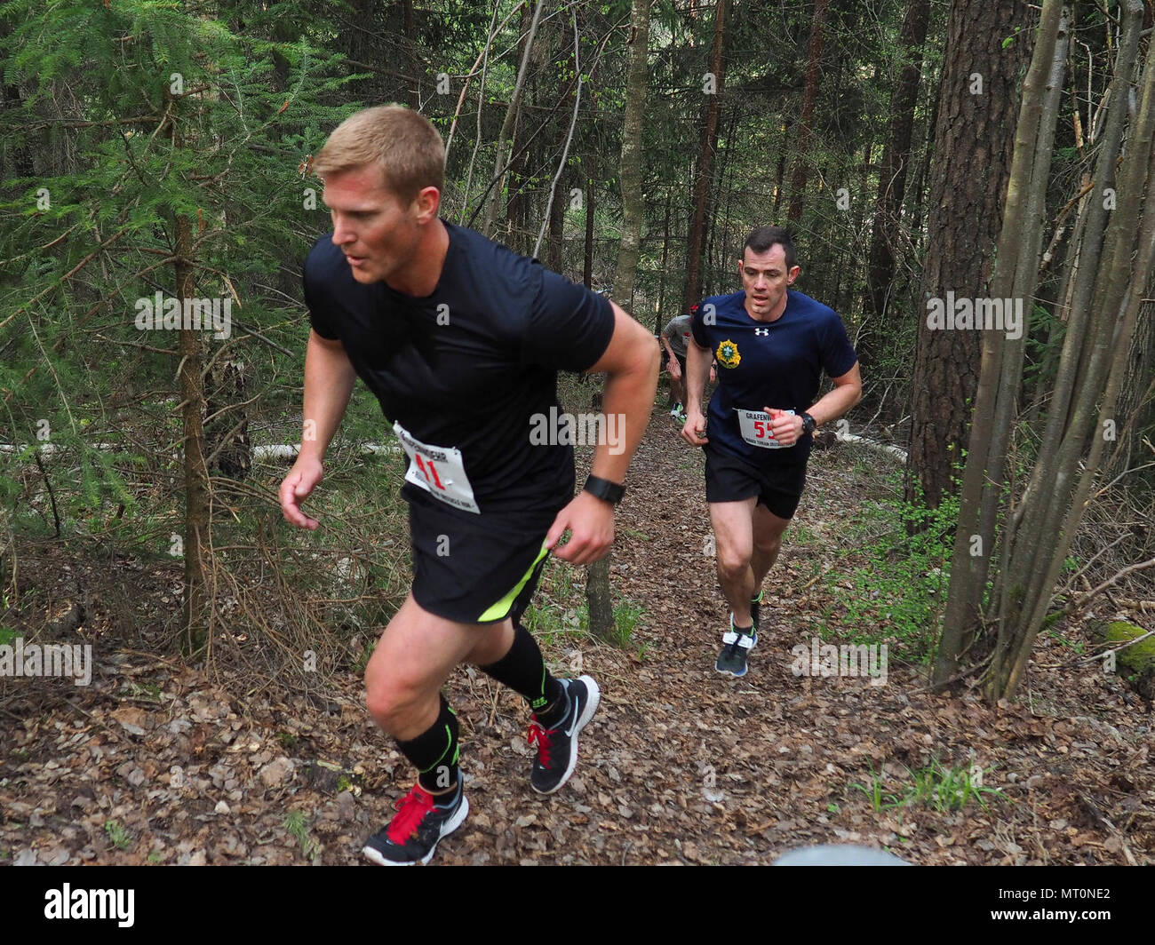 Runners participate in the annual Rugged Terrain Obstacle Run at ...