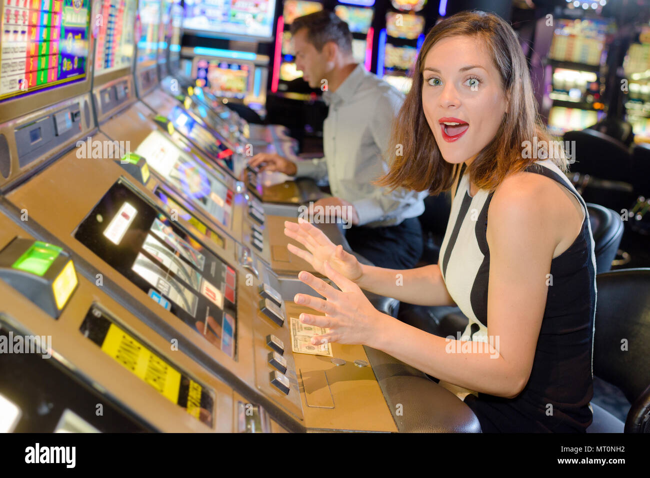 Woman playing arcade hi-res stock photography and images - Alamy