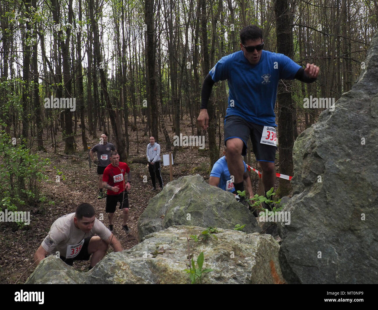 Runners participate in the annual Rugged Terrain Obstacle Run at ...