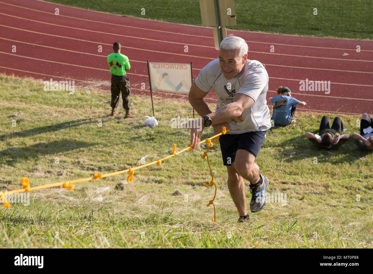 A participant climbs up a hill during the annual Marine Corps Marathon ...