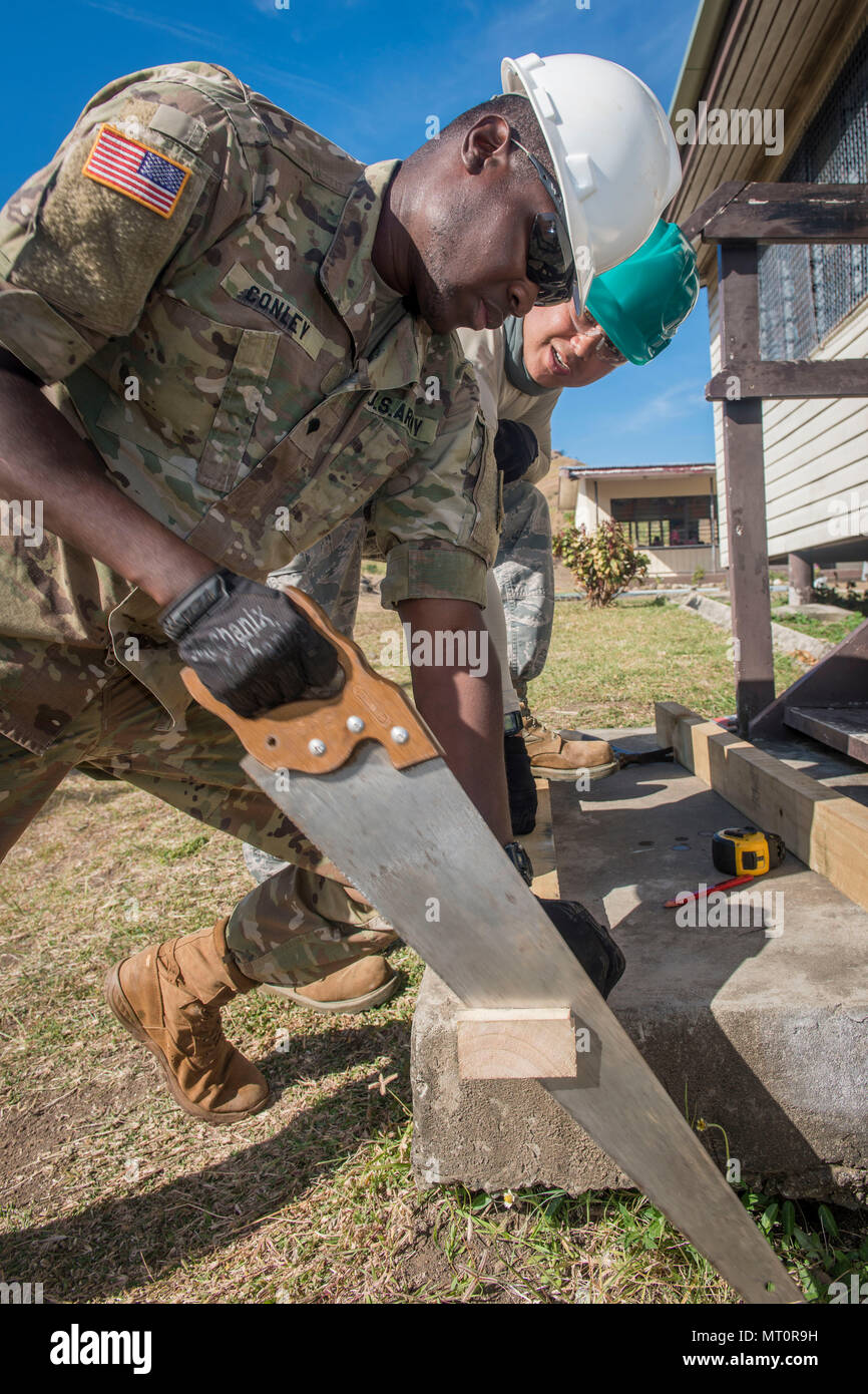 U.S. Army Spc. Solomon Conley, a carpentry and masonry specialist with ...