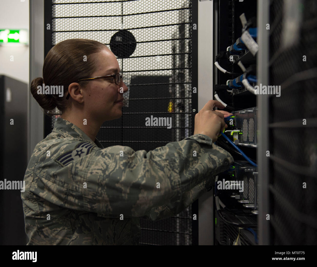 U.S. Air Force Staff Sgt. Shelby Carter, a network control center ...