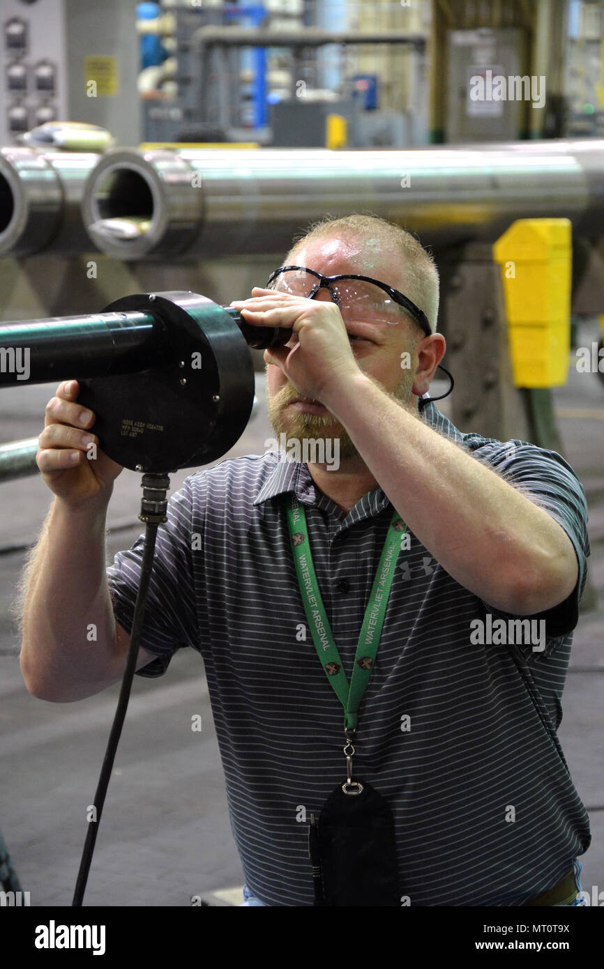Watervliet Arsenal Machine Tool Work Inspector Adam Nadeau, performing ...