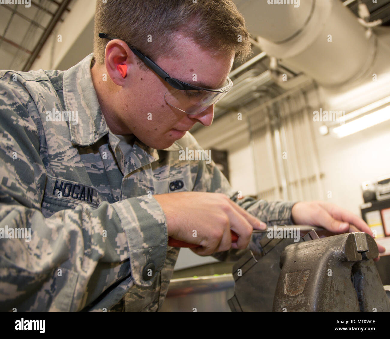 U.S. Air Force Senior Airman Preston Hogan, an aircraft structural ...