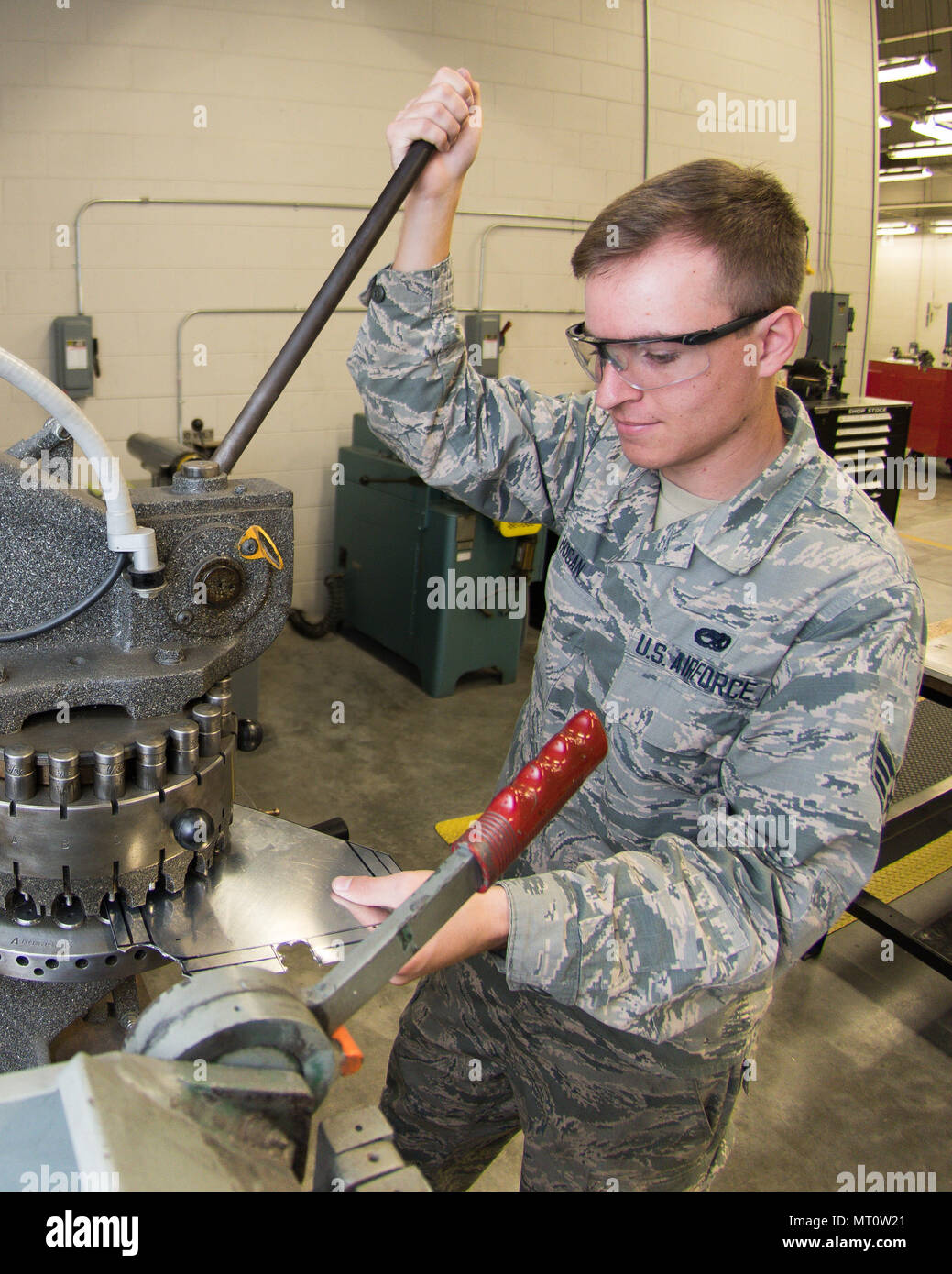 U.S. Air Force Senior Airman Preston Hogan, an aircraft structural ...