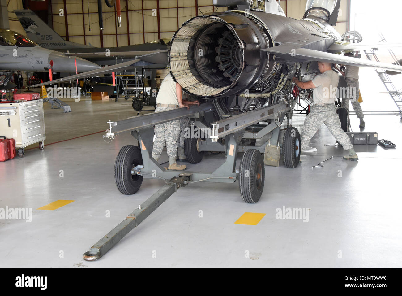 114th Aircraft Maintenance Squadron engine shop Airmen remove the ...