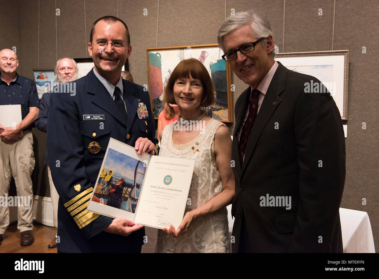Robert Pillsbury, President of the Salmagundi Club, stands beside Karen ...