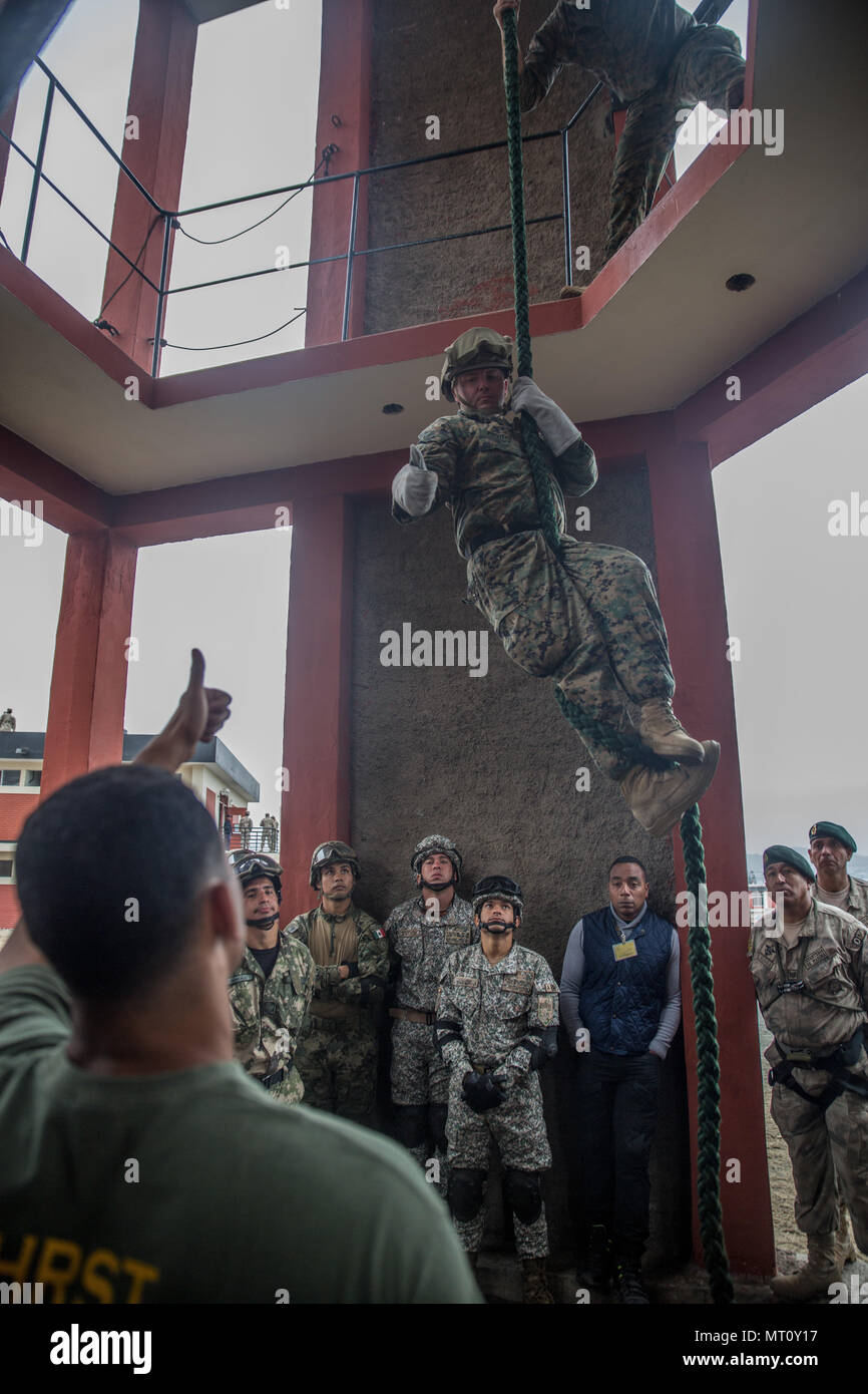U.S. Marines Staff Sgt Andrew Rodriguez, left, and Gunnery Sgt ...
