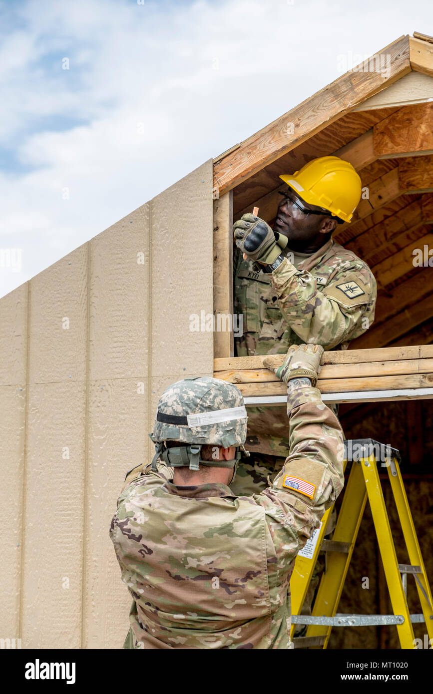 New York Army National Guard Spc. Kyei, with the 1156th Engineer ...