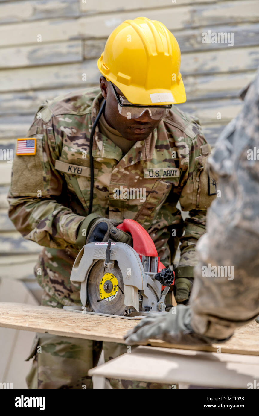 New York Army National Guard Spc. Kyei, with the 1156th Engineer ...