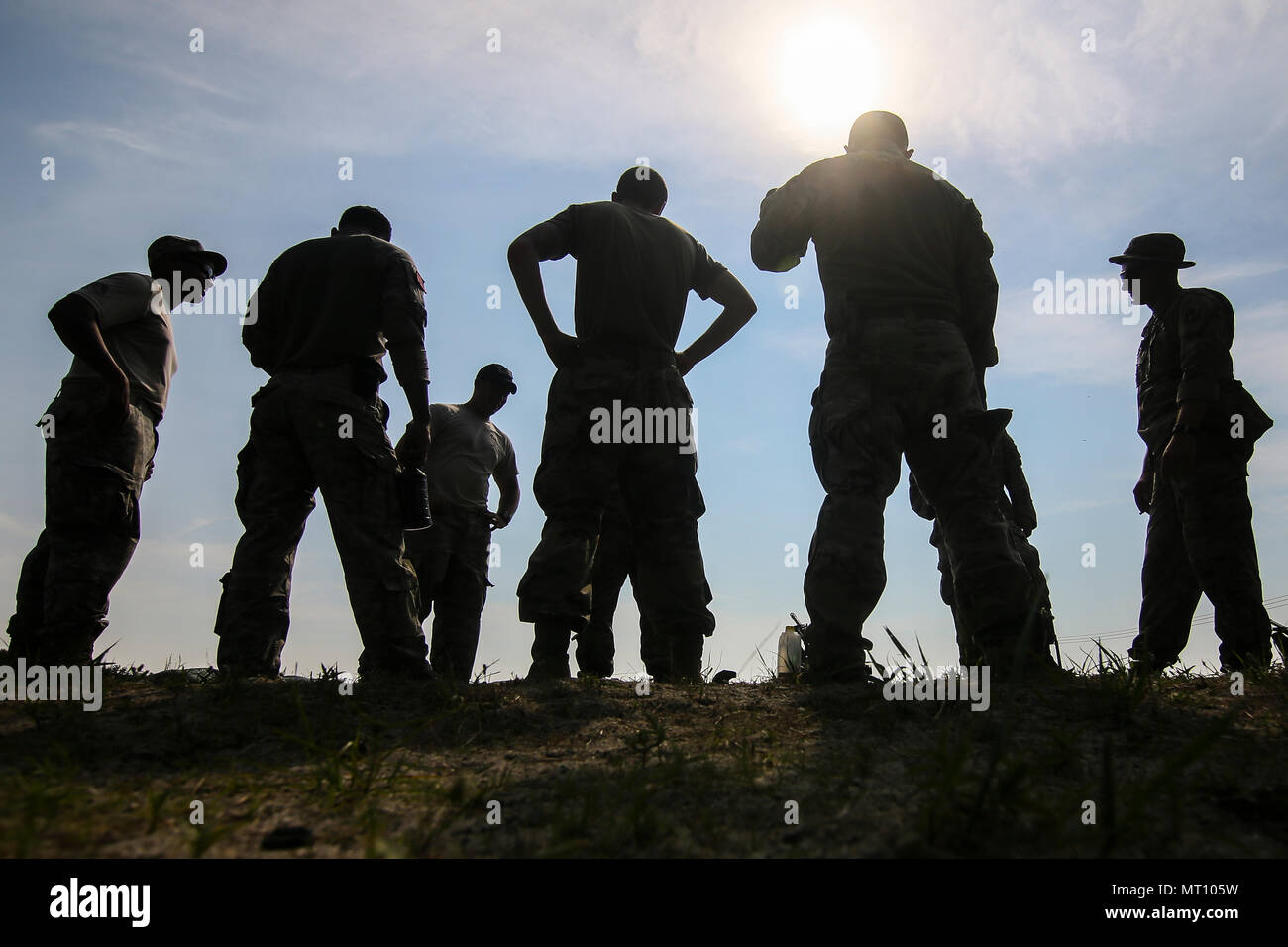 U.S. Army Soldiers are briefed on a course of fire during the Squad ...